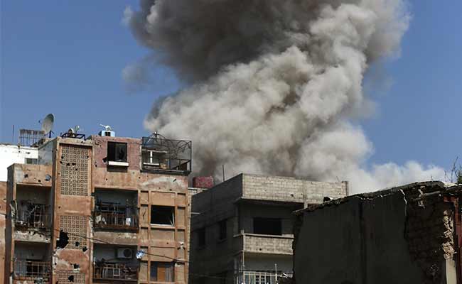 26 Dead in Syria Regime Air Raids Near Damascus: Monitor
